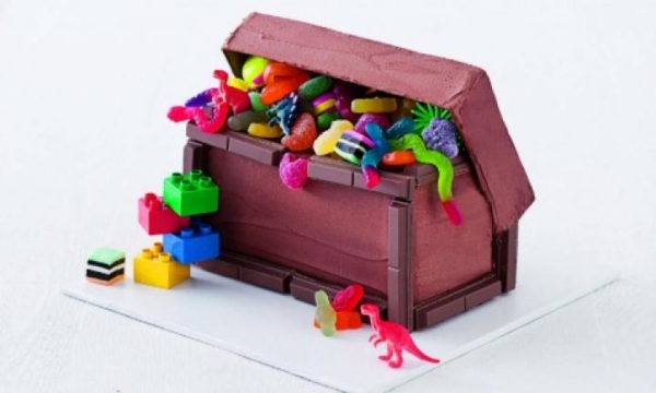Chock-a-block toy box birthday cake